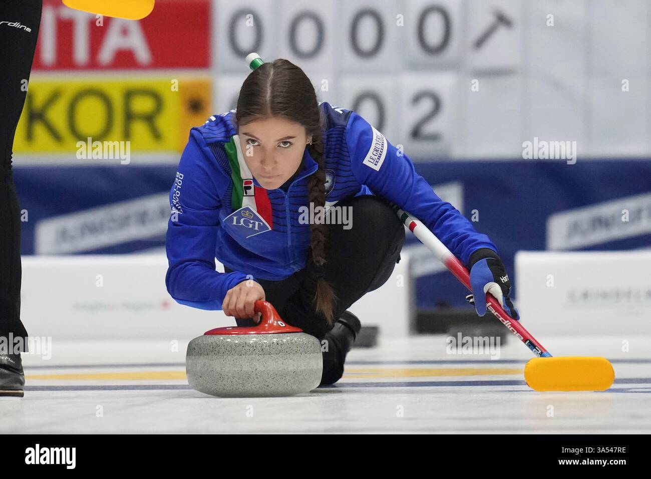 Italy's Giulia Zardini Lacedelli releases the stone during the match ...