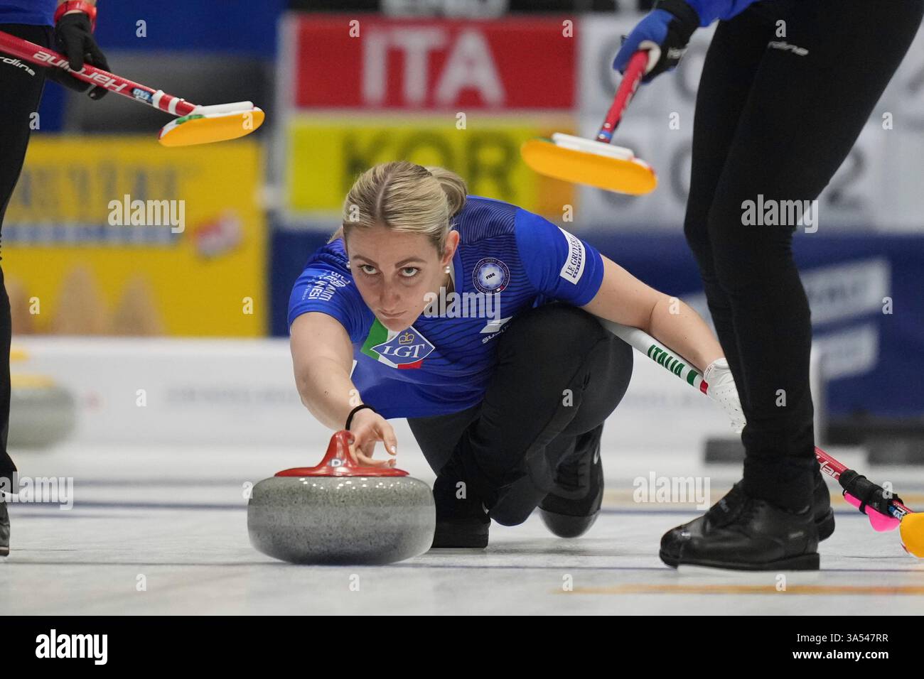 Italy's Elena Mathis releases the stone during the match against South ...