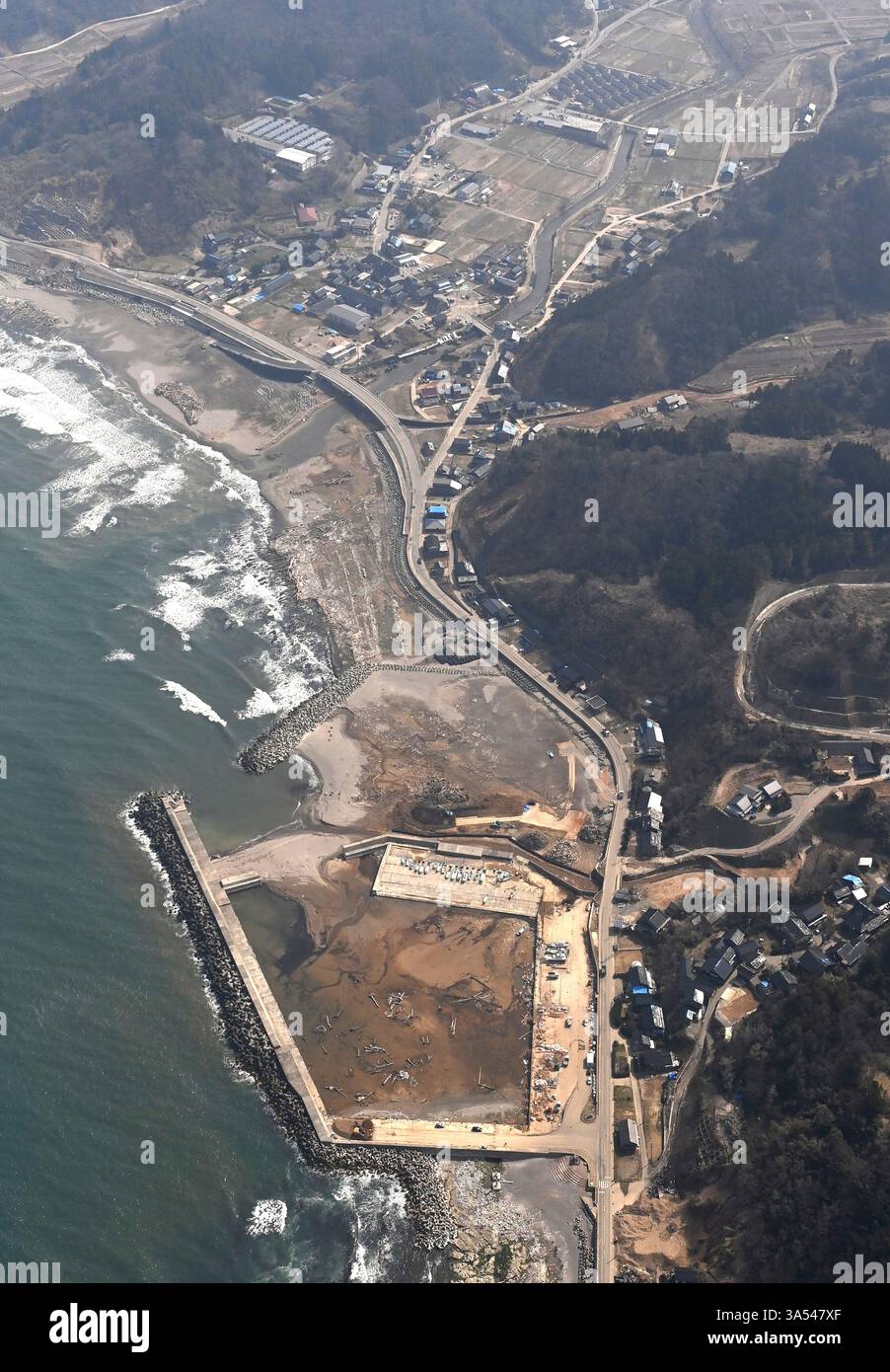 An aerial photo shows at the Nafune fishing port in Wajima City ...