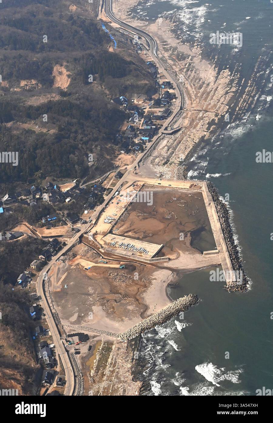 An aerial photo shows at the Nafune fishing port in Wajima City ...