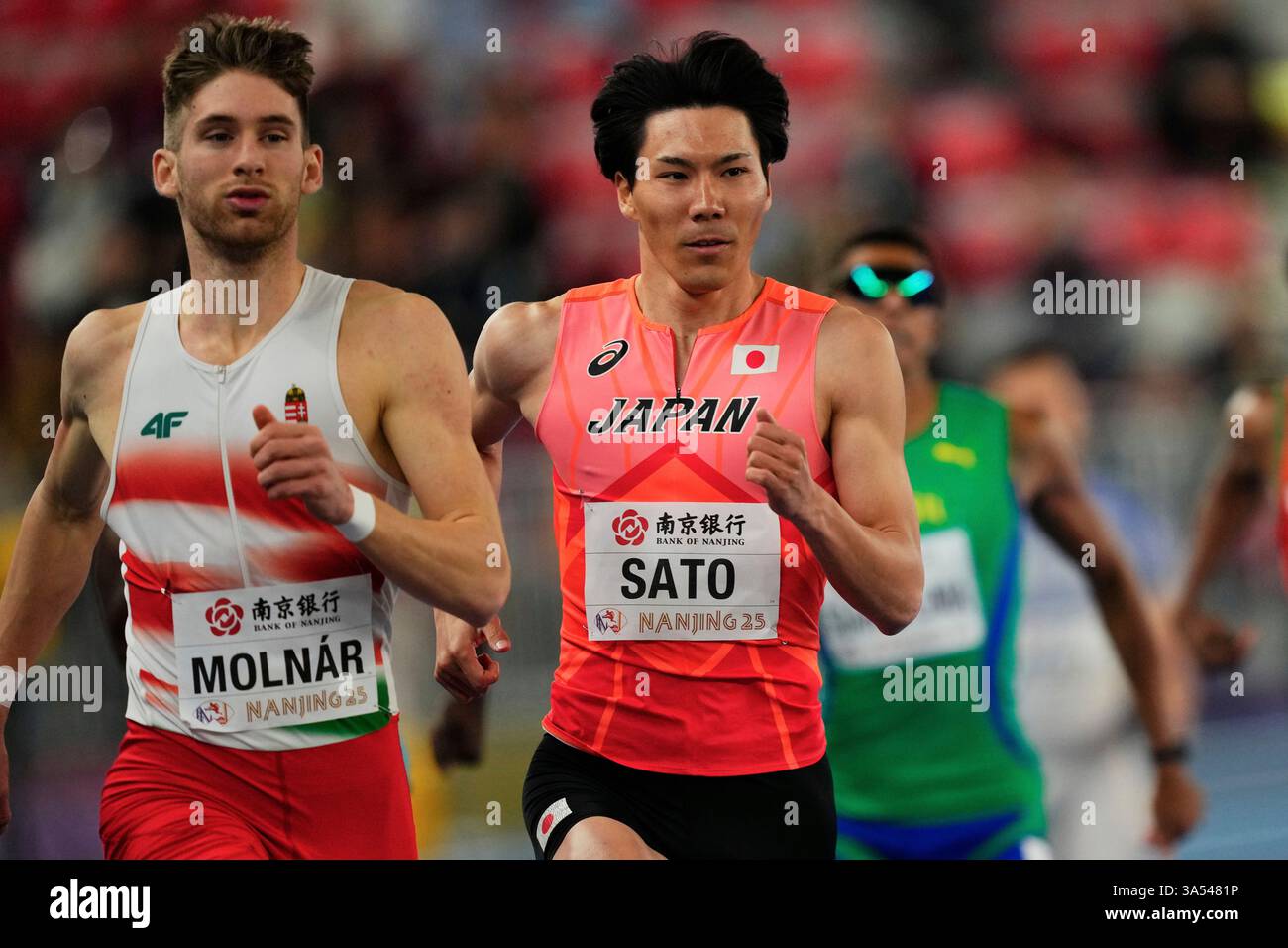 Attila Molnar of Hungary, left, and Fuga Sato of Japan compete in 400 ...