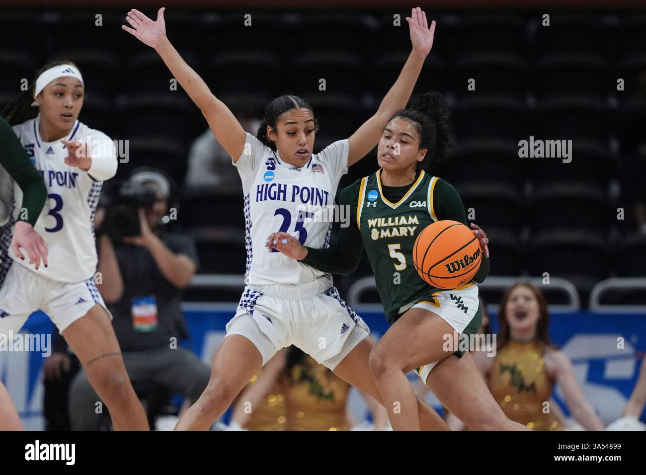 William & Mary guard Bella Nascimento (5) drives against High Point ...