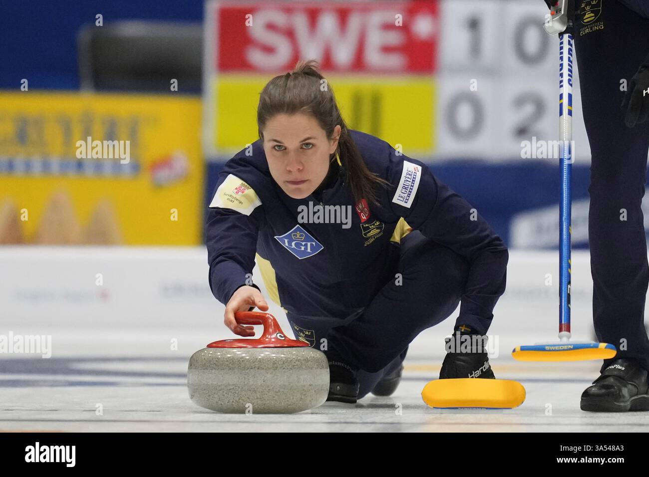Sweden's skip Anna Hasselborg releases the stone during the match ...