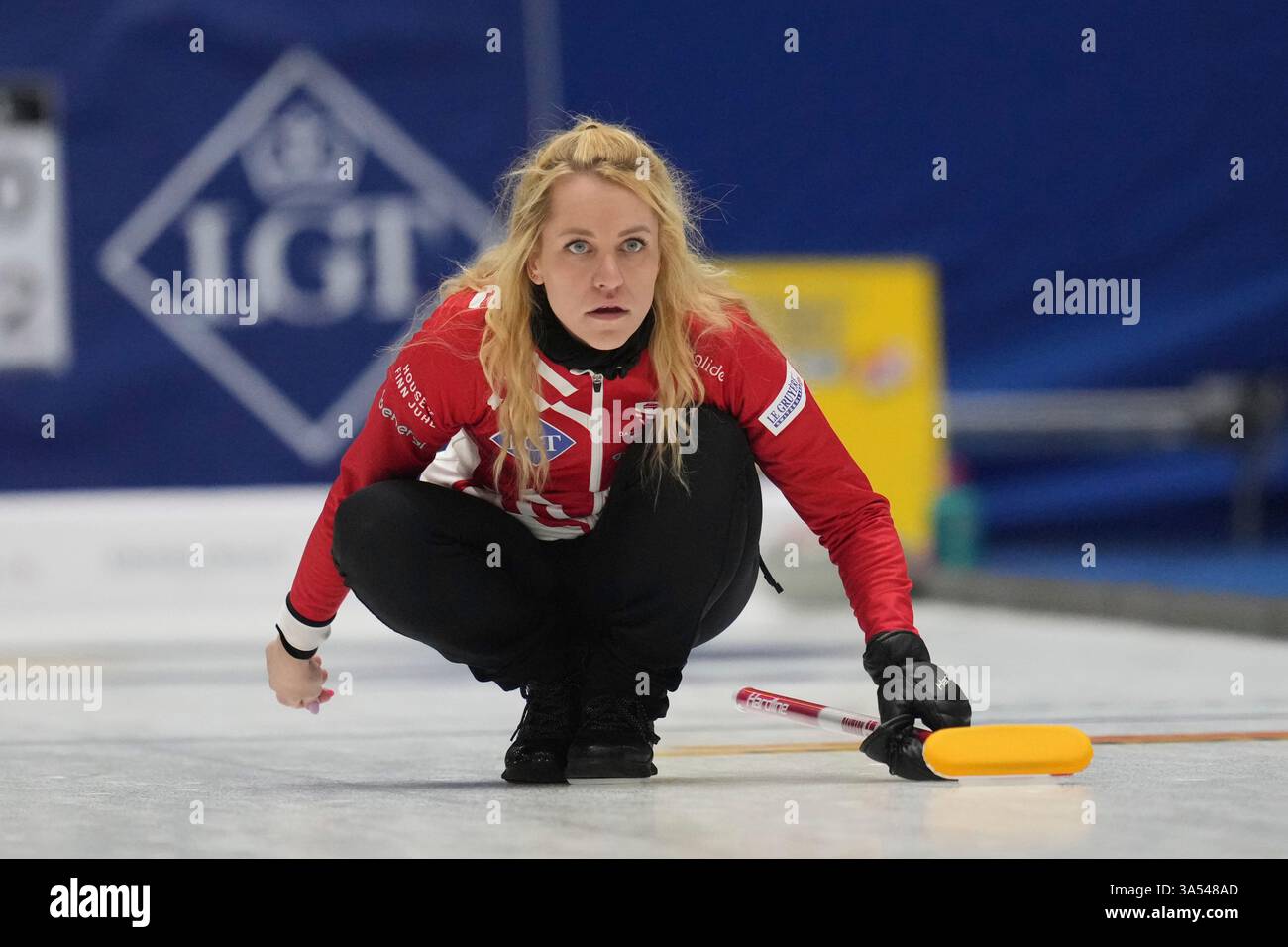 Denmark's skip Madeleine Dupont calls the sweep during the match ...
