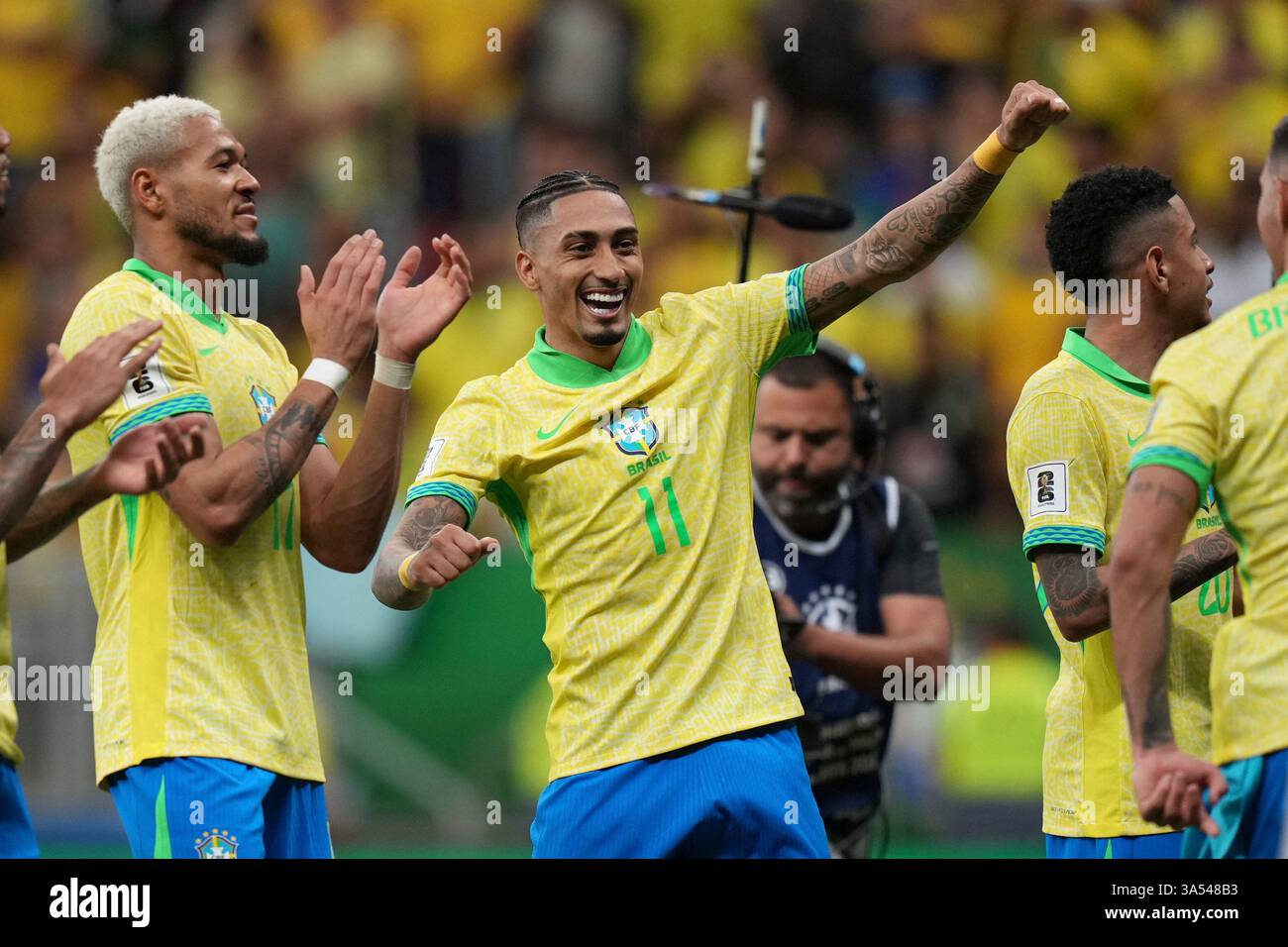Brazil's Raphinha, center, and teammates celebrate their team's 2-1 ...