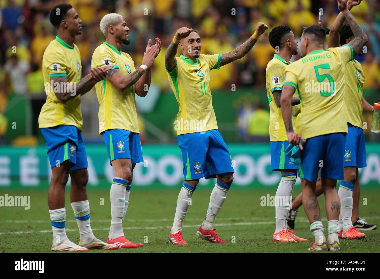 Brazil's Raphinha, center, and teammates celebrate their team's 2-1 ...