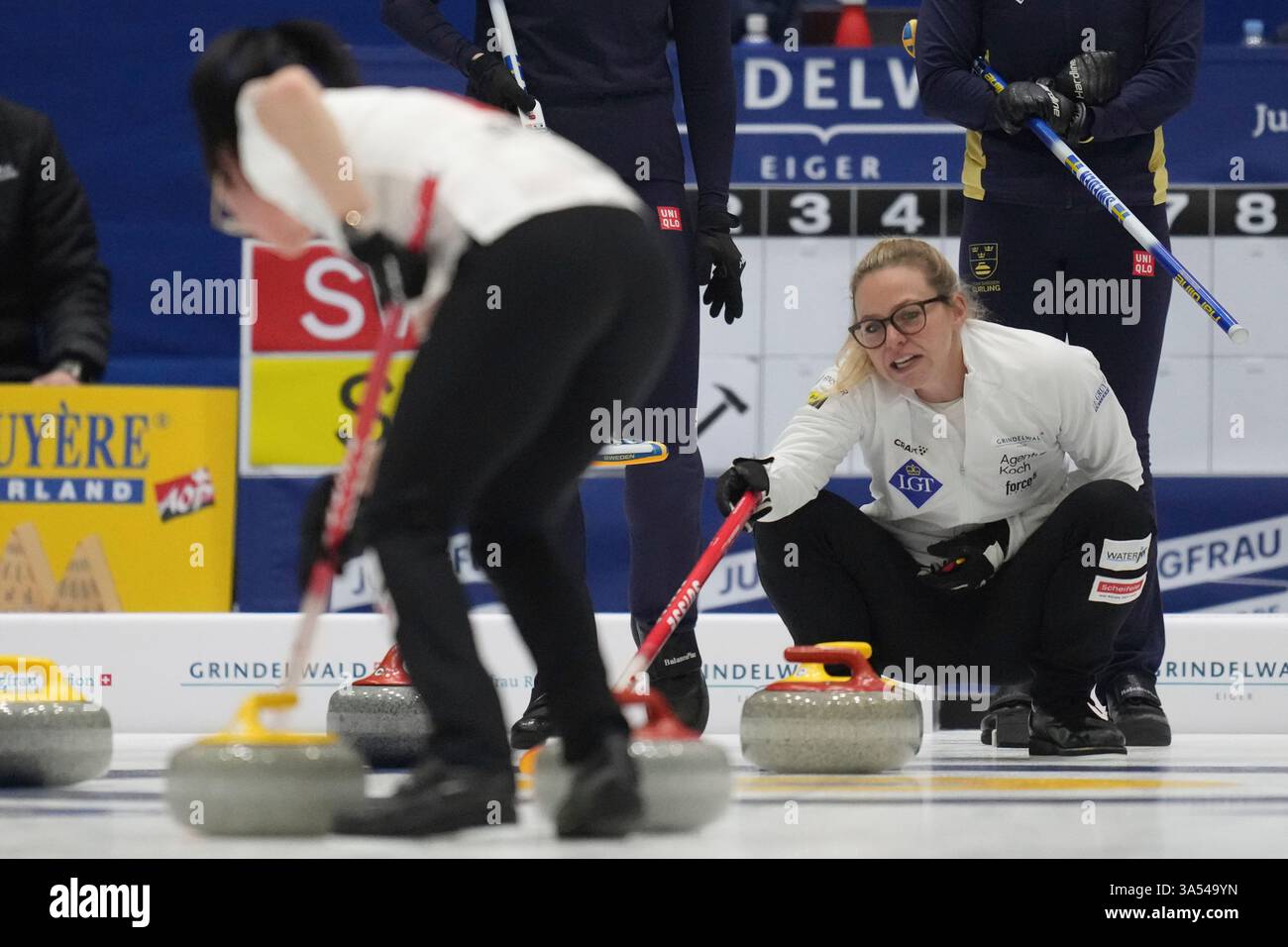 Switzerland's Alina Paetz calls the sweep during the match against ...