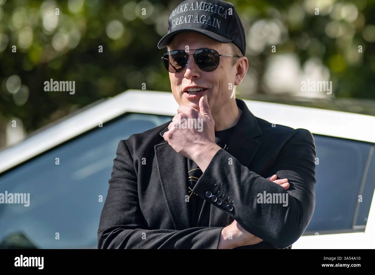 Elon Musk with a Tesla Cybertruck at the White House, along with ...