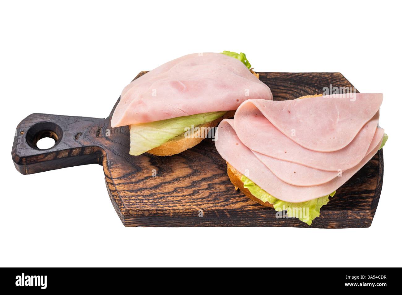 Freshly made ham sandwich on artisanal bread, inviting you to enjoy a ...