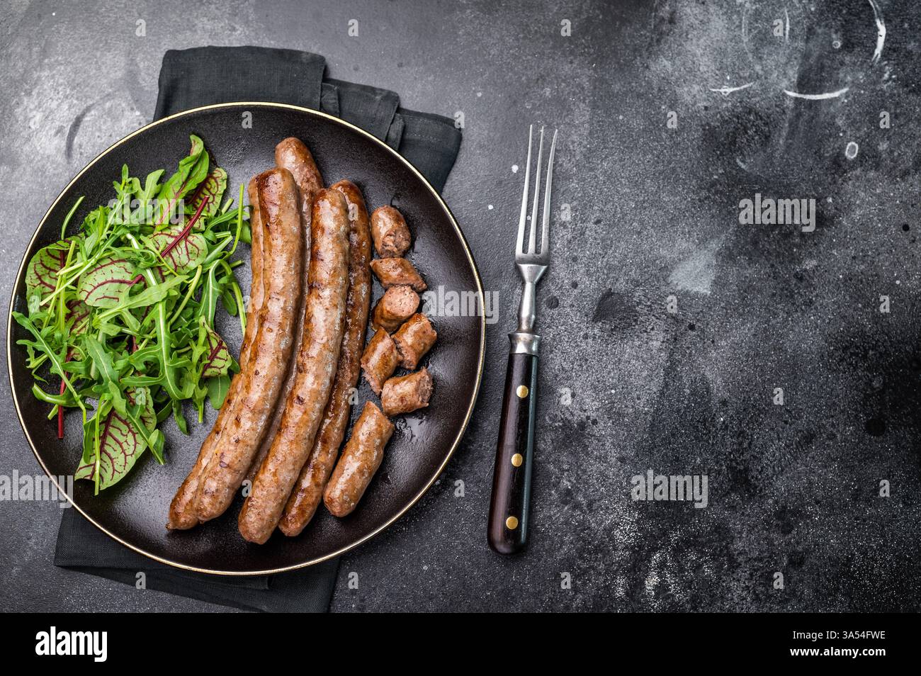 Smoky grilled sausage with grill marks, perfect for satisfying cravings ...