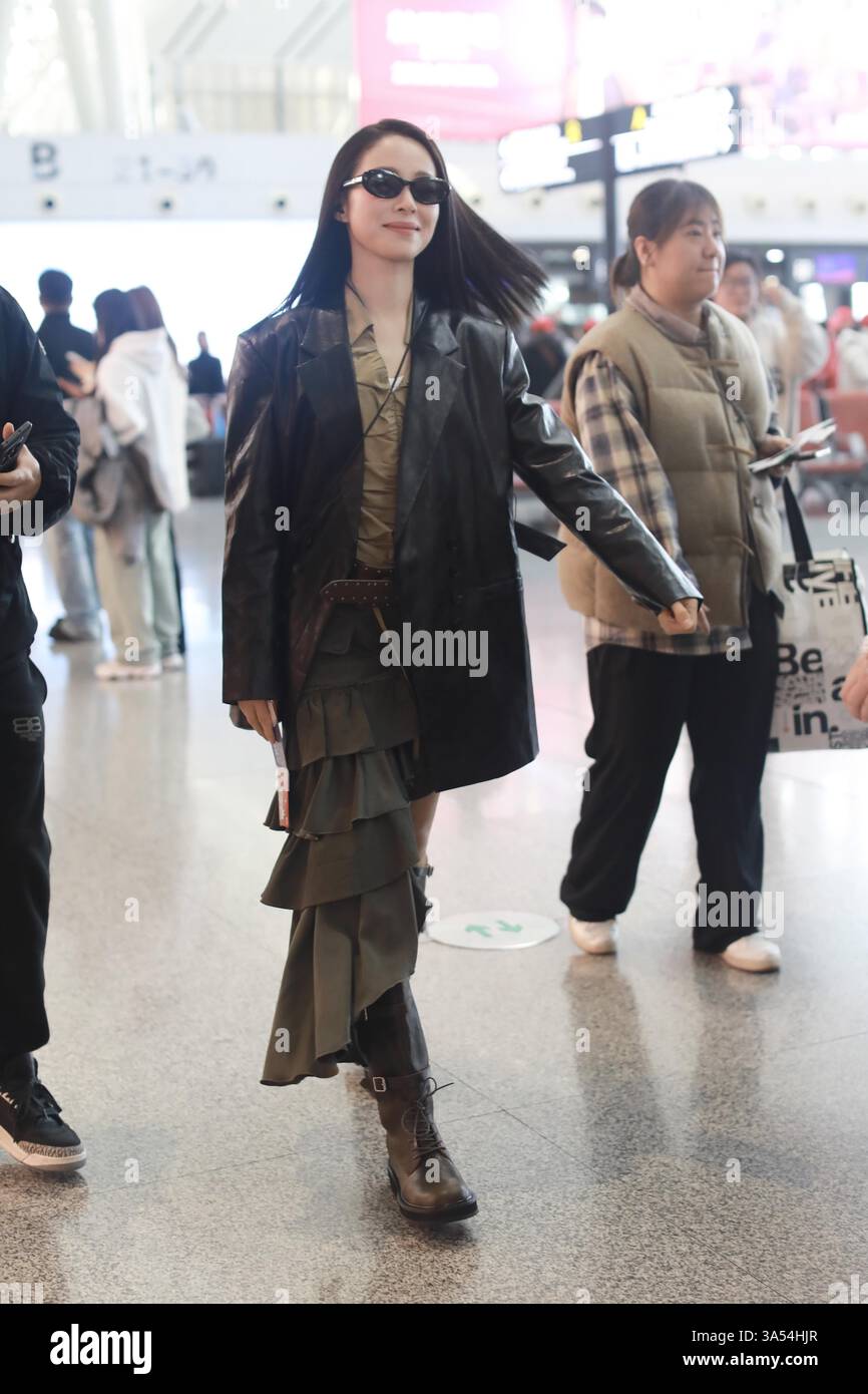 Chinese actress and singer Jiang Yiyan appears at the airport in ...