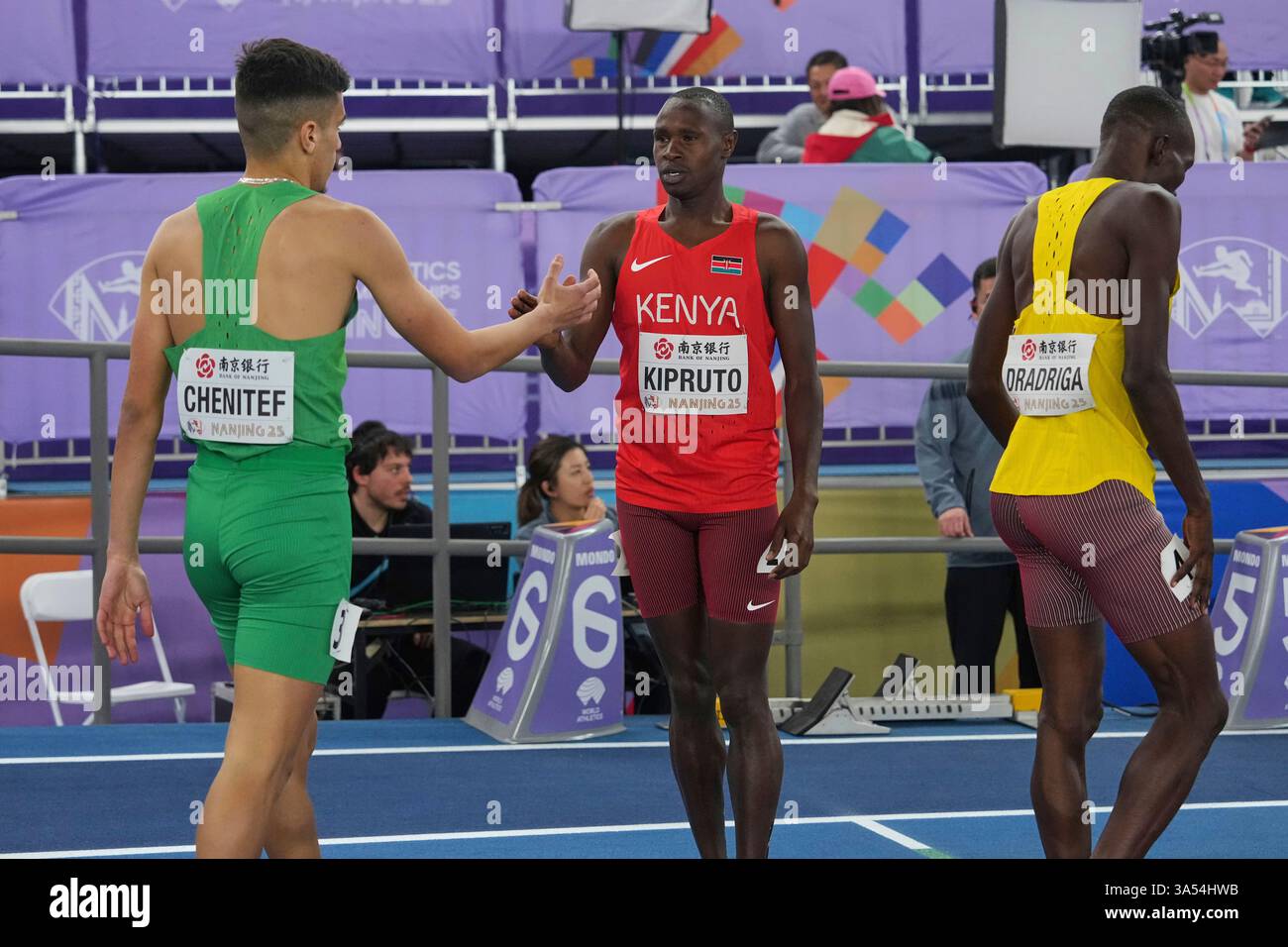 Heithem Chenitef of Algeria, left, greets Collins Kipruto of Kenya ...