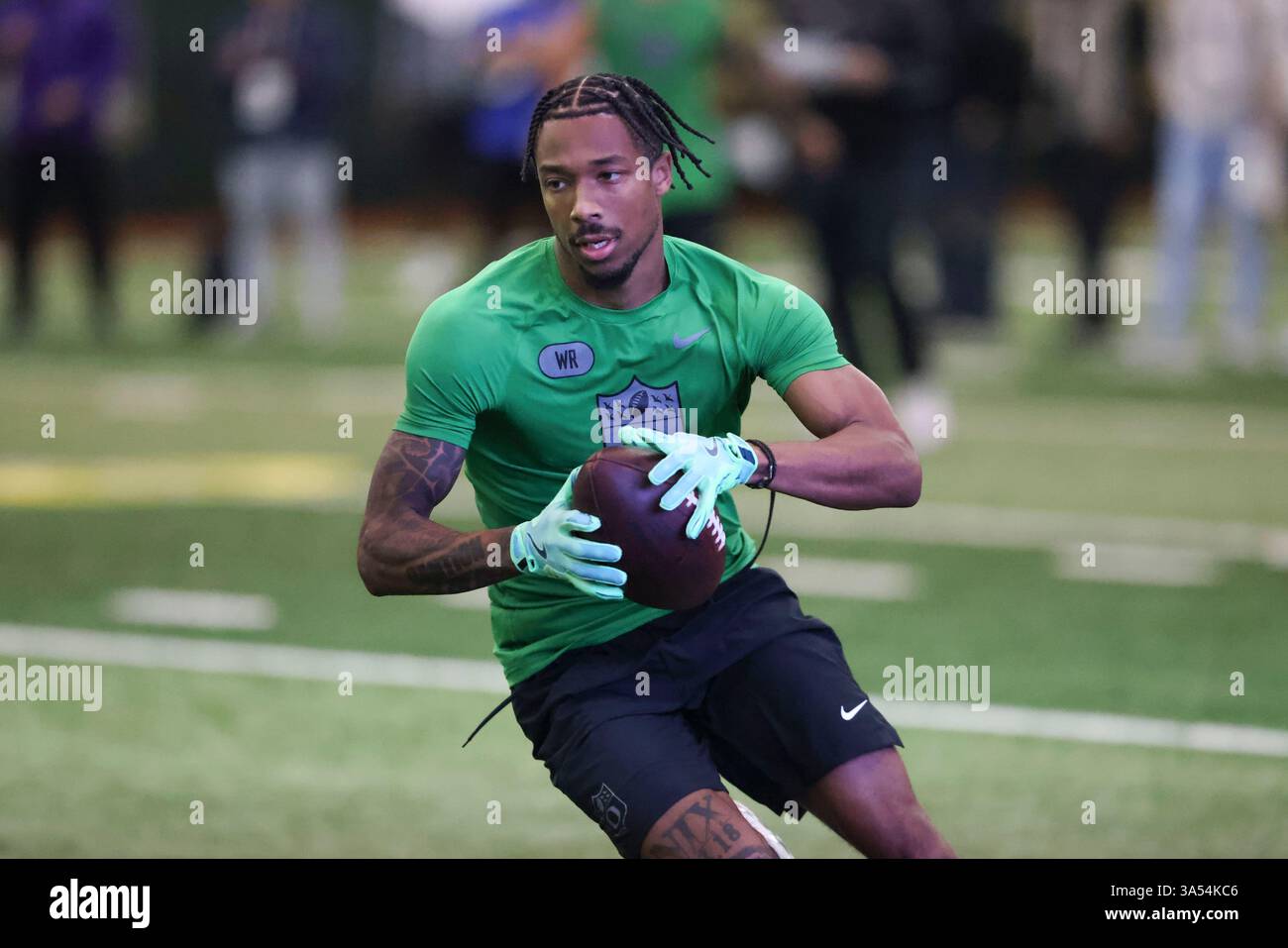 Oregon wide receiver Tez Johnson (15) runs a position drill at the ...