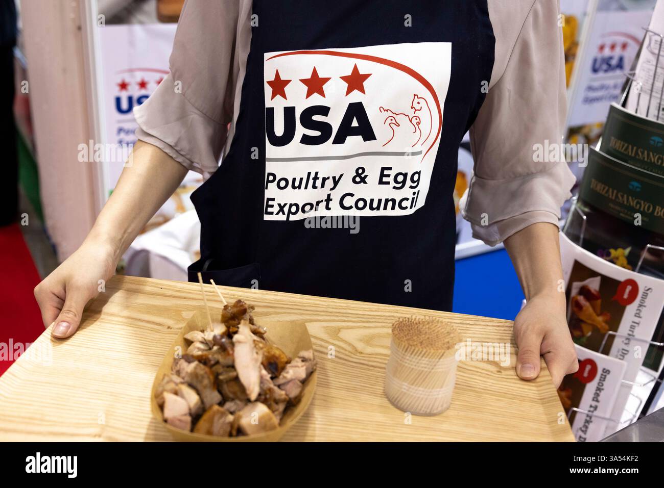 Grilled chicken is being offered inside the USA exhibition pavilion at ...