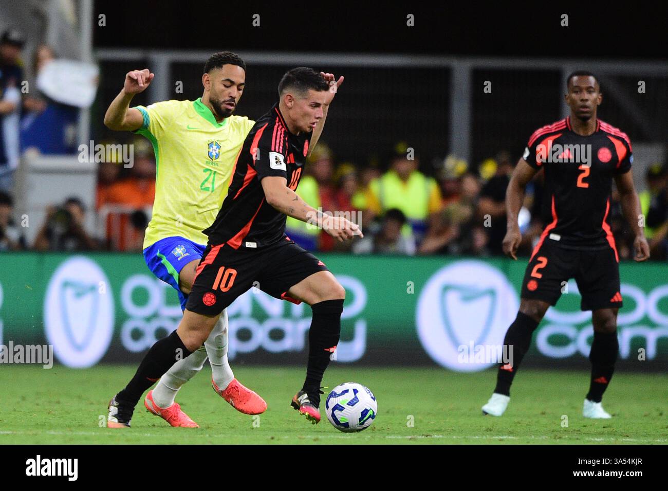 Brasilia, Brazil. 20th Mar, 2025. James Rodrigues (C) of Colombia vies ...