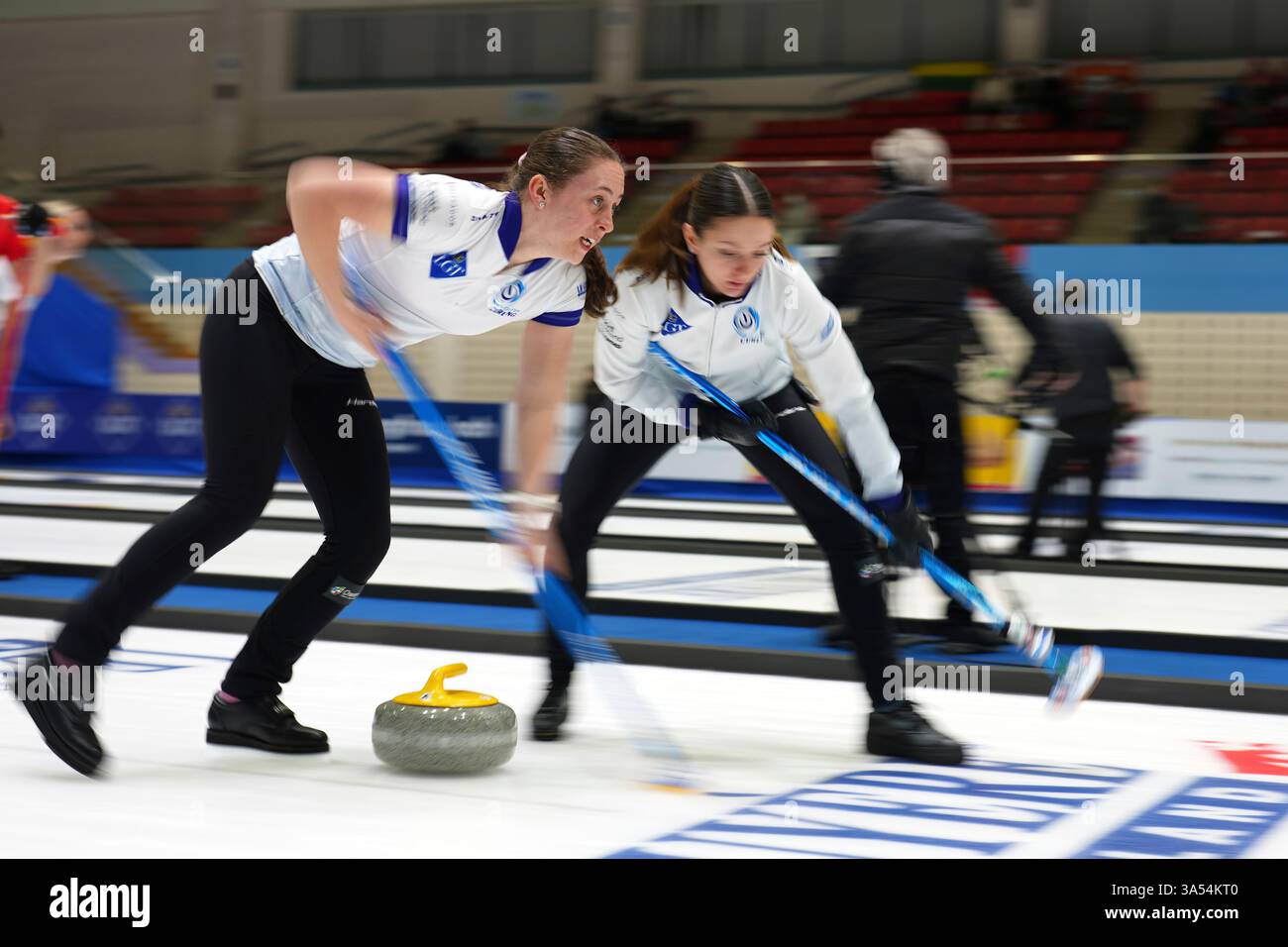 Scotland's Rebecca Morrison and Fay Henderson sweep during the match against China at the World ...