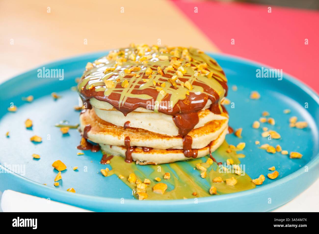 Dubai chocolate kunafa pancakes served at a fancy restaurant cafe Stock ...