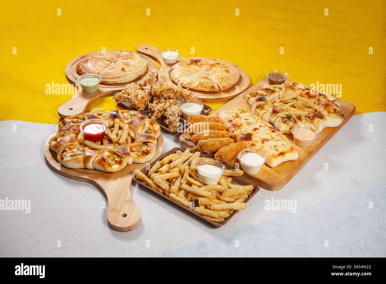 Feast of different flavoured stuffed naans platter flatbread with sides ...