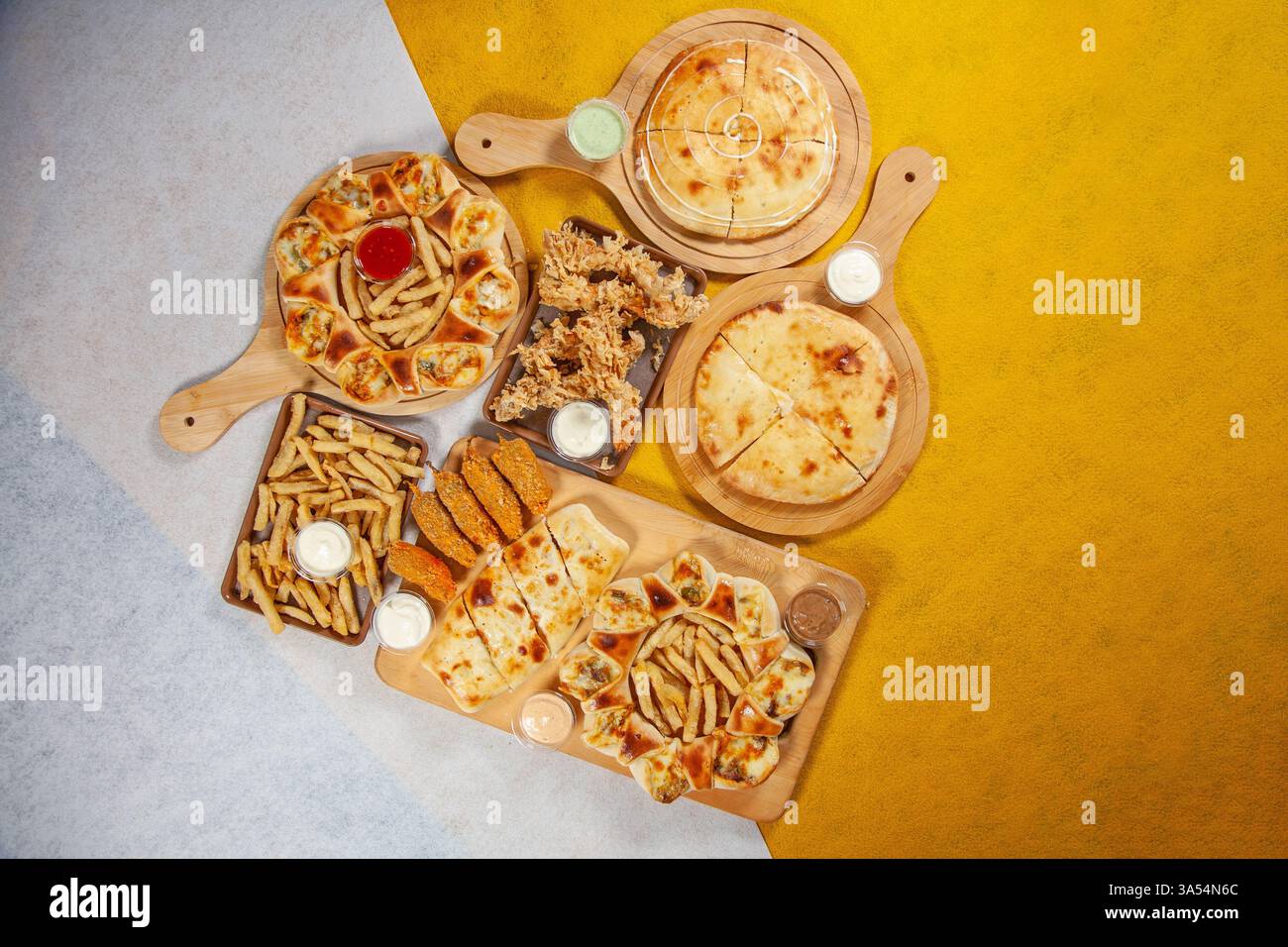 Feast of different flavoured stuffed naans platter flatbread with sides ...