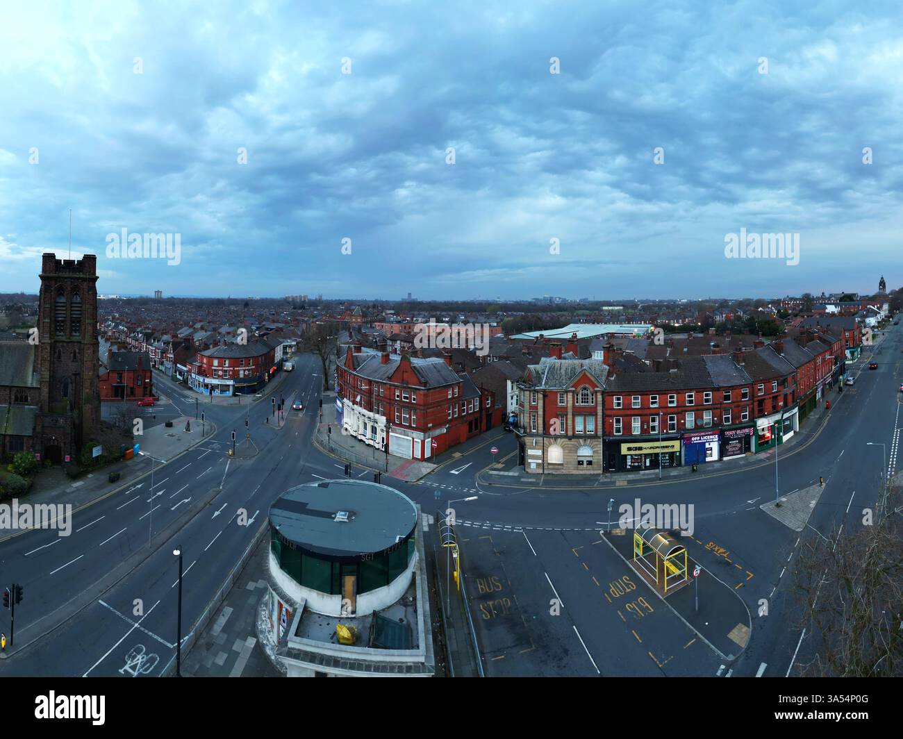 Aerial view of Penny Lane area of Liverpool at sunrise, featuring ...