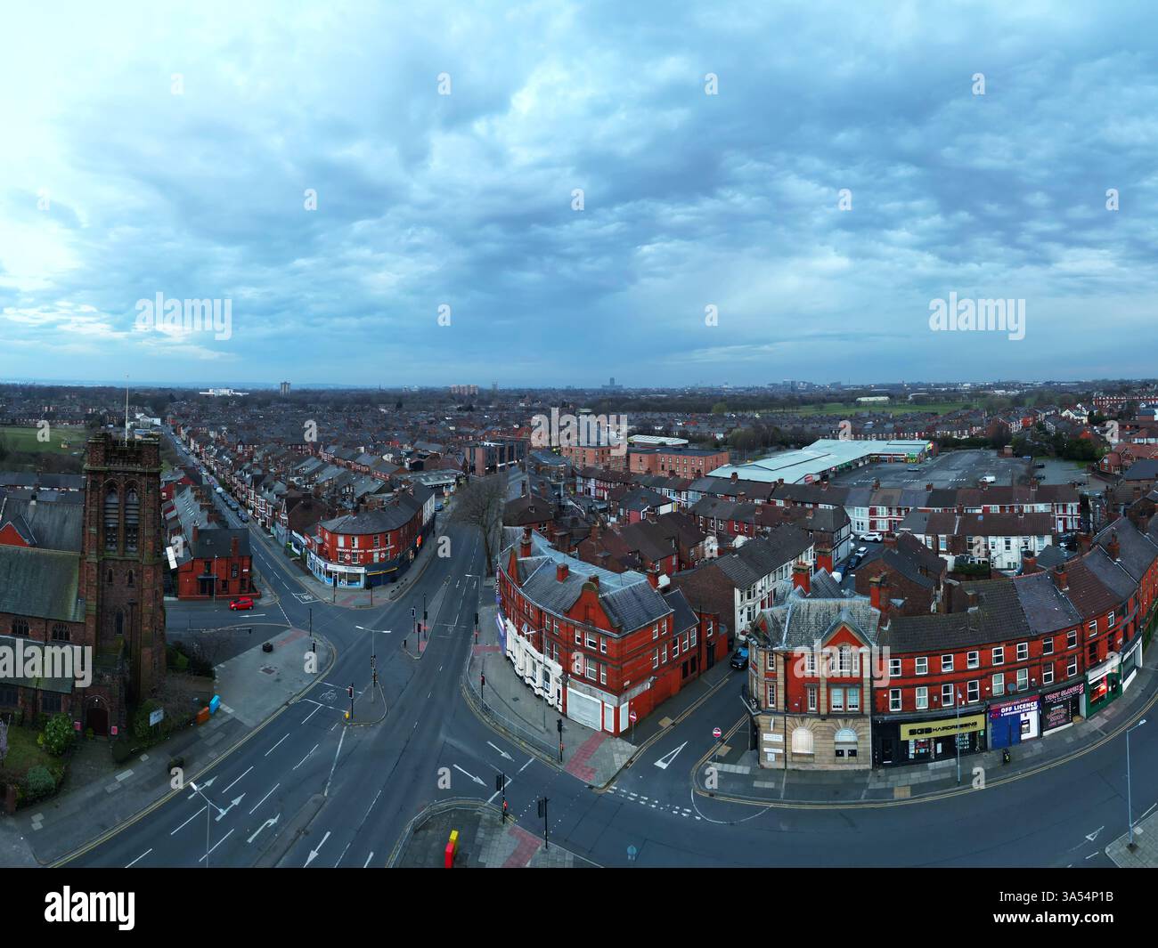 Aerial view of Penny Lane area of Liverpool at sunrise, featuring ...