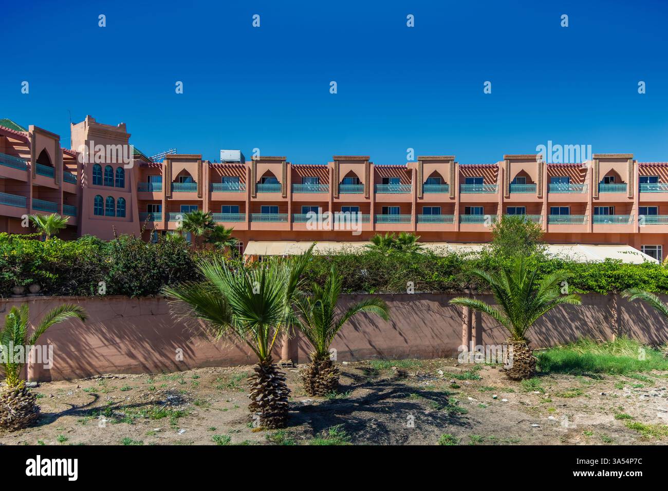 Mogador Kasbah. Luxury hotel with Moroccan arches, wrought iron ...