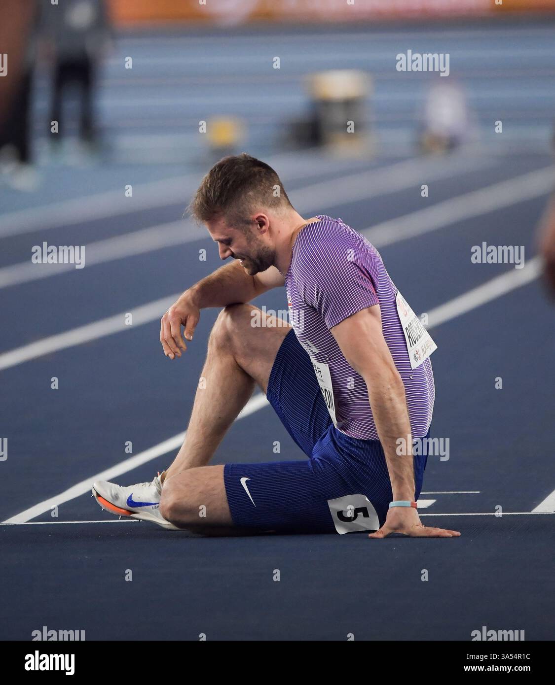 Andrew Robertson of Great Britain pulls up injured in the 60 meters ...