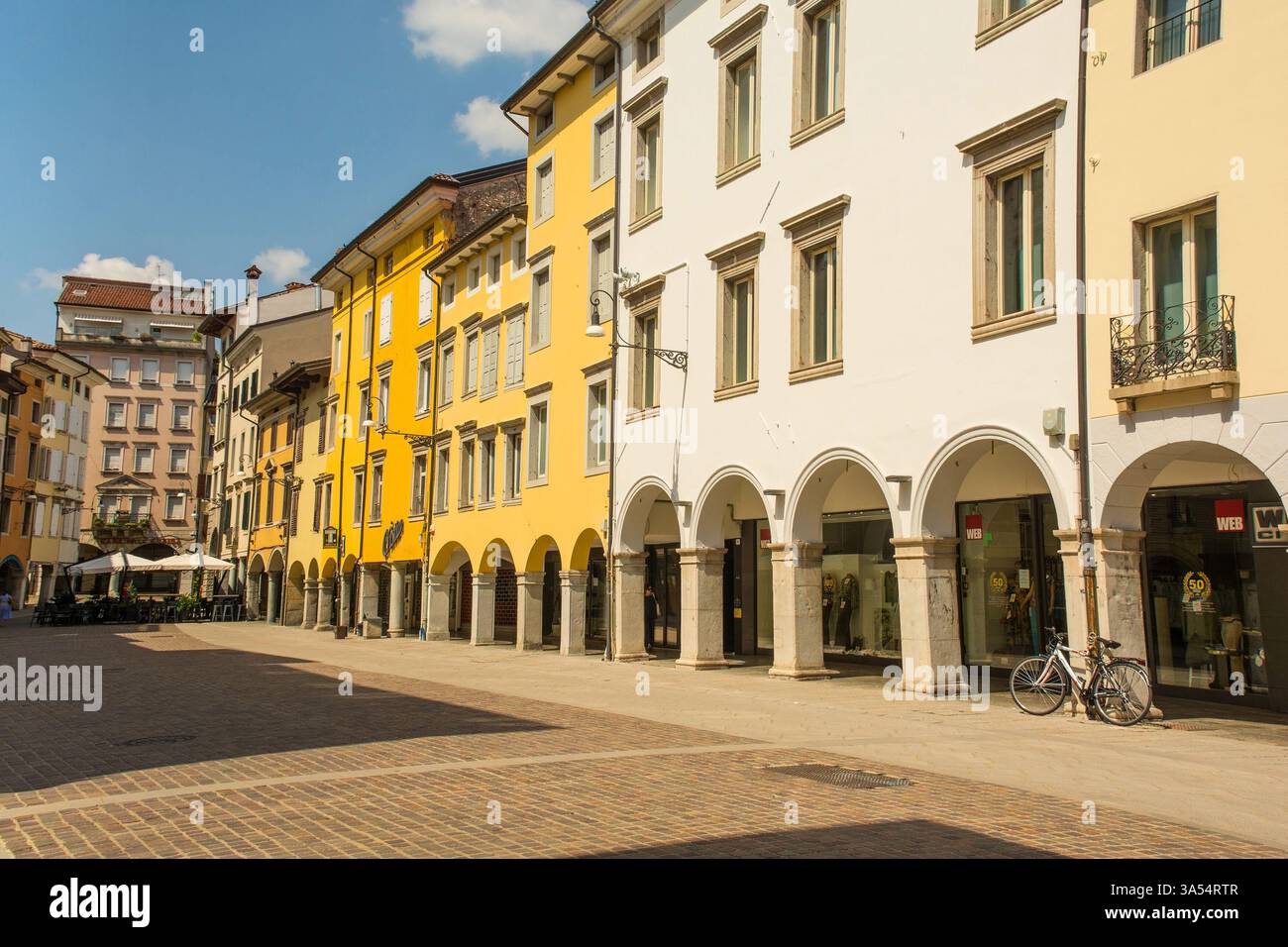 Udine, Italy - July 9th 2024. Historic porticoed buildings on Via ...