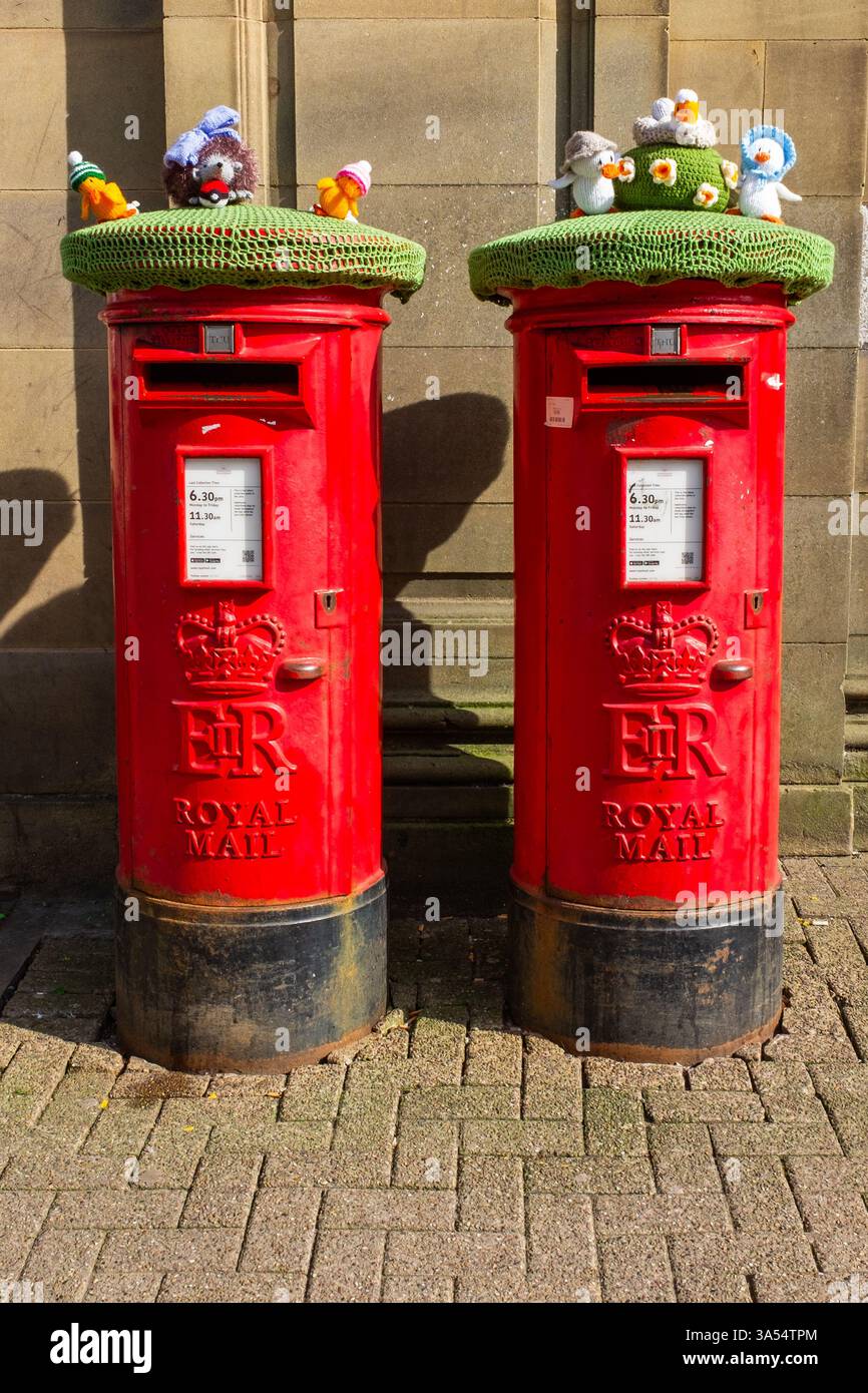 Knitted Post Box Toppers on post boxes outside the Post Office in ...