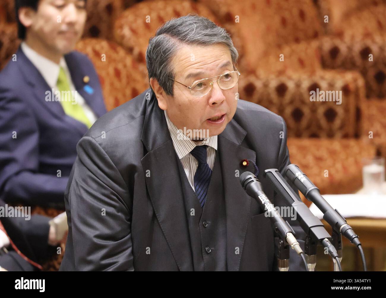 Tokyo, Japan. 21st Mar, 2025. Japanese Internal Affairs Minister Seiichiro Murakami answers a ...