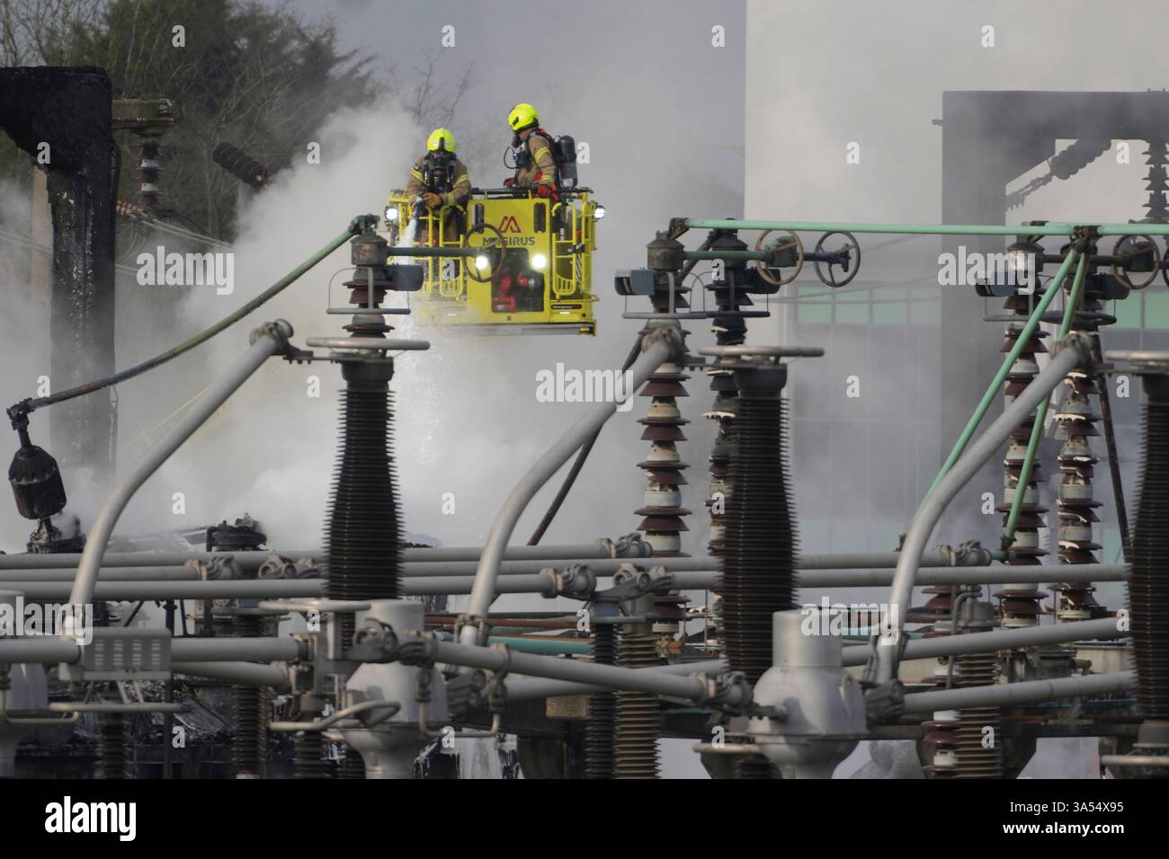 Firefighters extinguish the fire at the North Hyde electrical ...