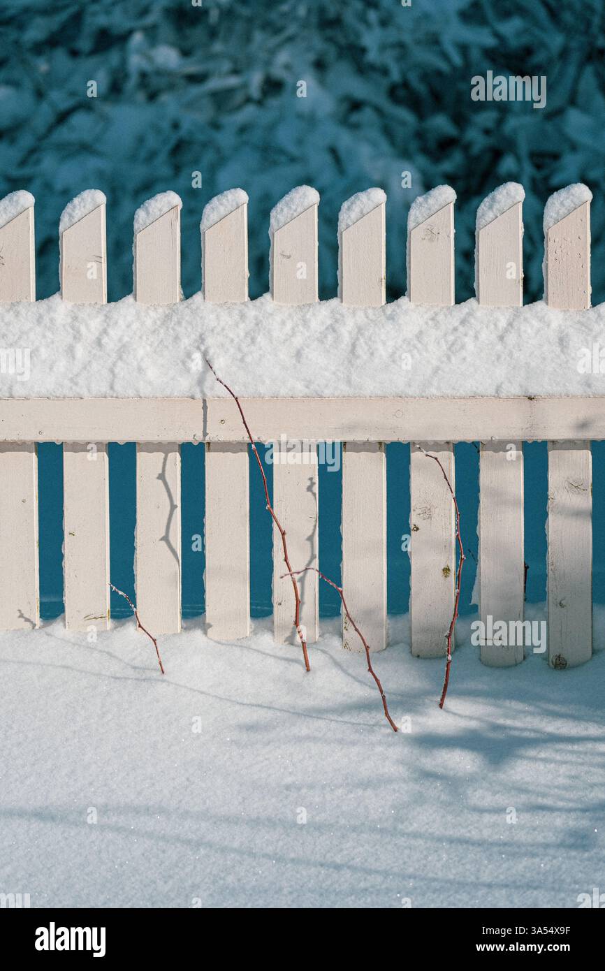 Picket fence in the snow Stock Photo - Alamy