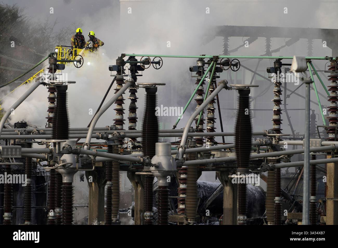 Firefighters extinguish the fire at the North Hyde electrical ...