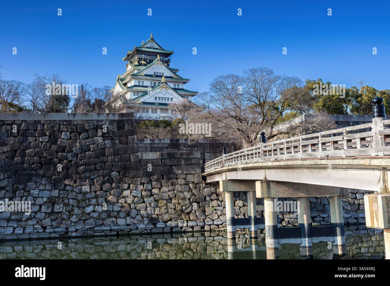 Osaka Castle in Osaka, Japan. Looking across the moat; entry bridge to ...