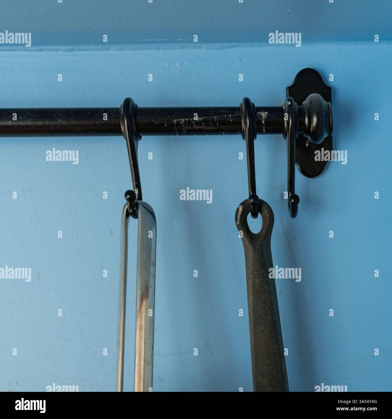 Boiler hanger on a blue farmhouse kitchen Stock Photo - Alamy