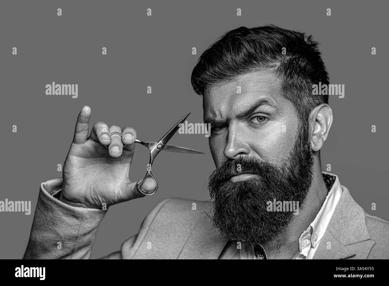 Man grooming beard scissors Black and White Stock Photos & Images - Alamy