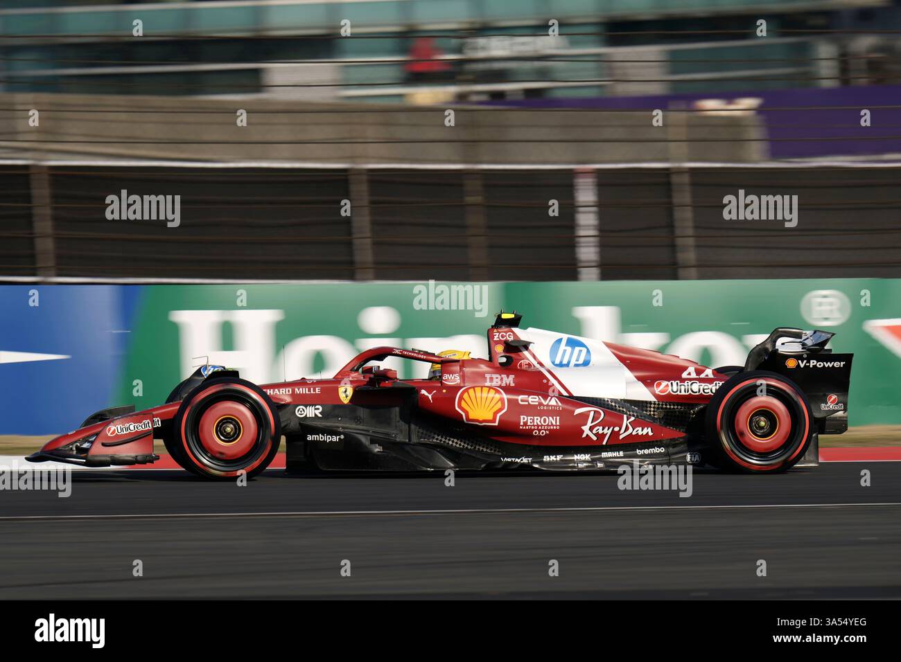 Ferrari driver Lewis Hamilton of Britain steers his car during the ...