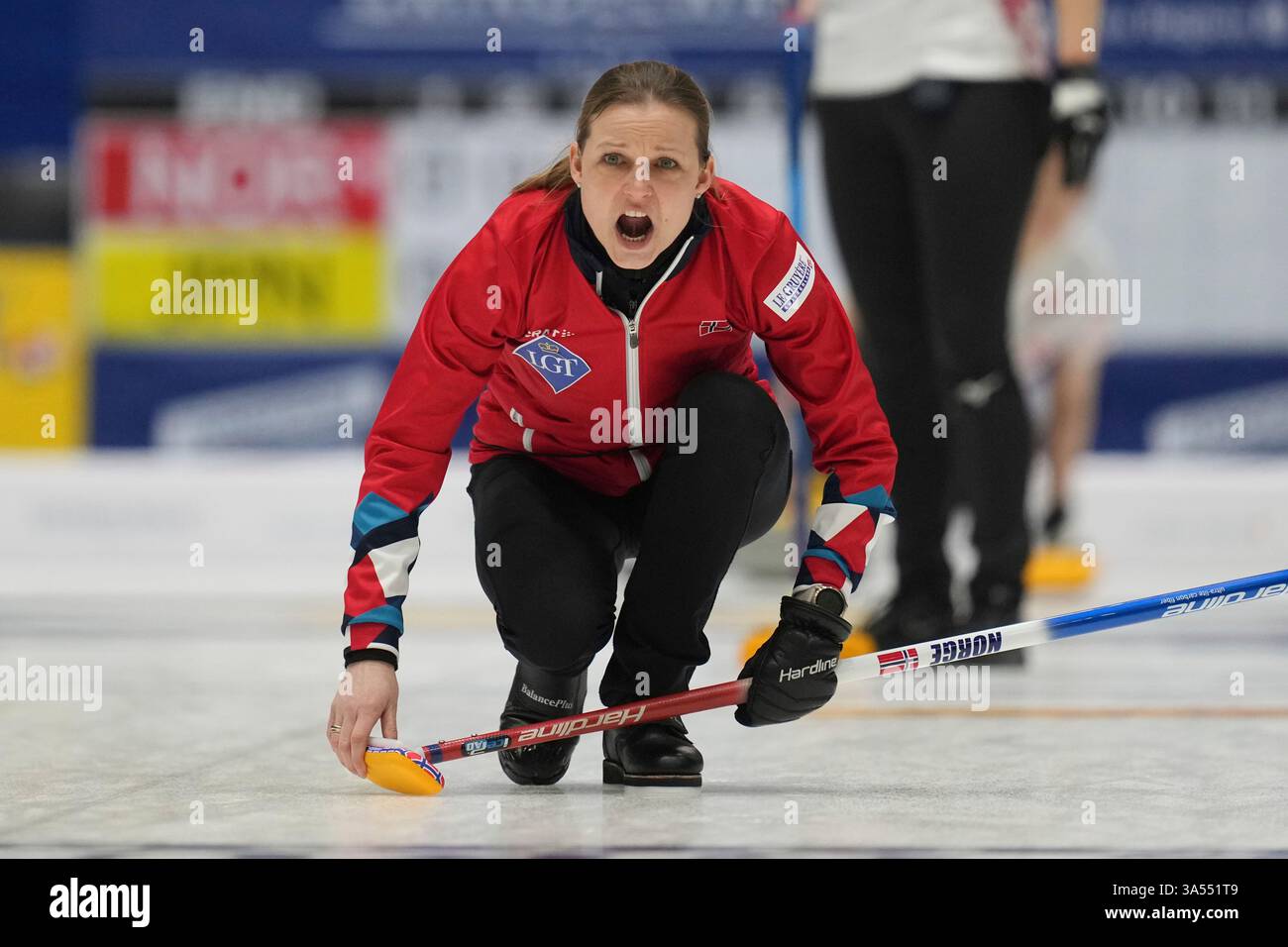 Norway's skip Marianne Roervik calls the sweep during the match against Japan at the World Women ...
