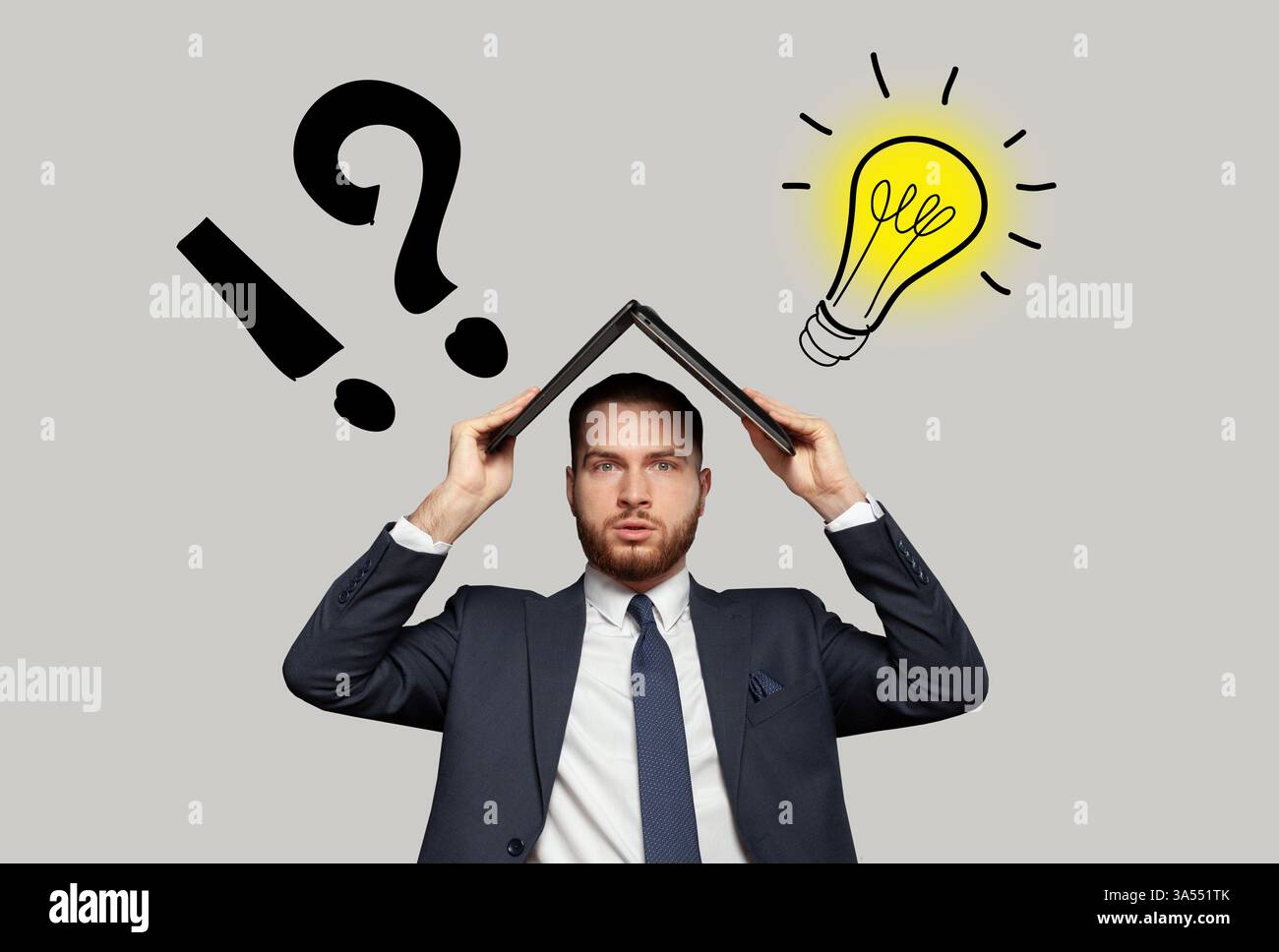 Businessman working in stress hiding under his laptop with exclamation ...