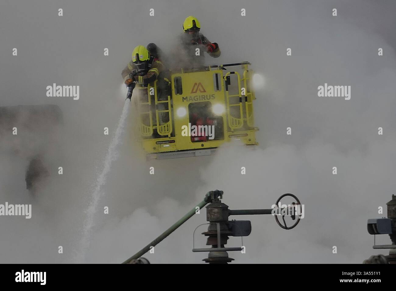 Firefighters extinguish the fire at the North Hyde electrical ...