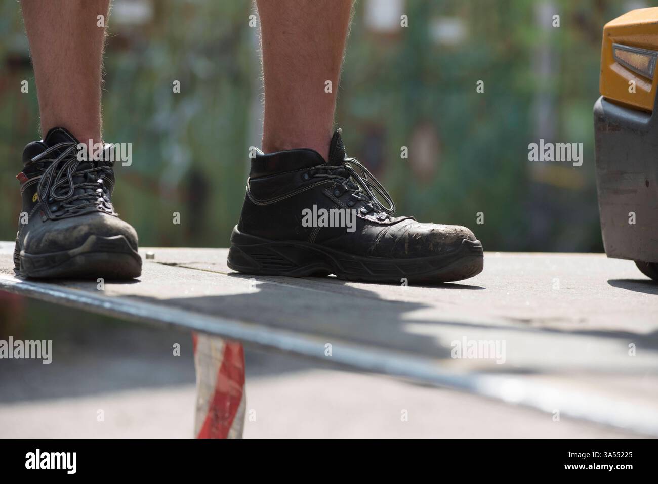 Wearing work shoes prevention hi-res stock photography and images - Alamy