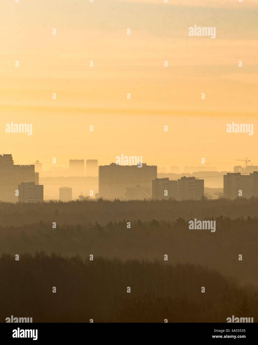 Air pollution in the city. Dust fog and smog. Misty sunrise in Moscow ...