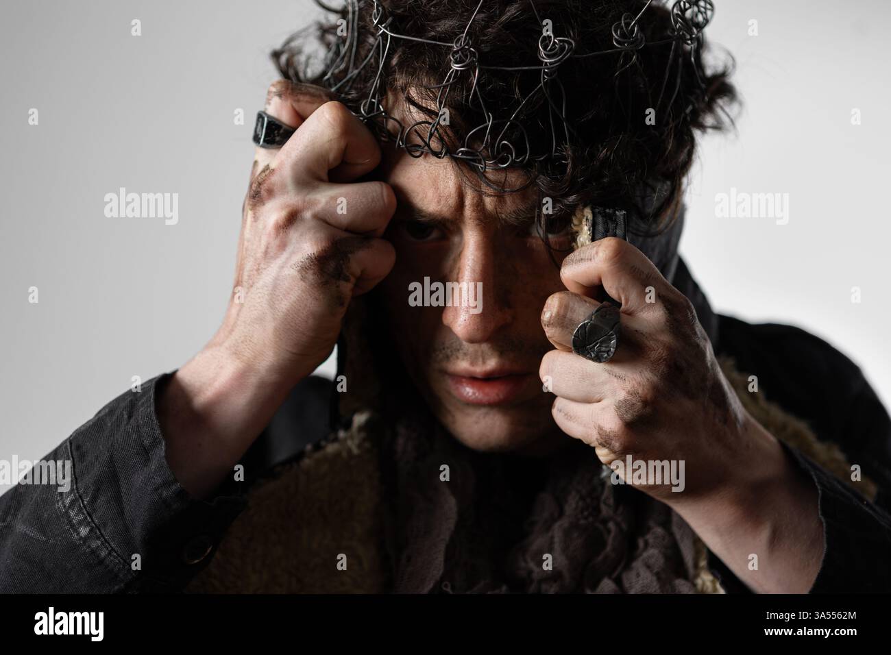 Hamlet in modern grunge or post-apocalyptic reinterpretation, young man ...