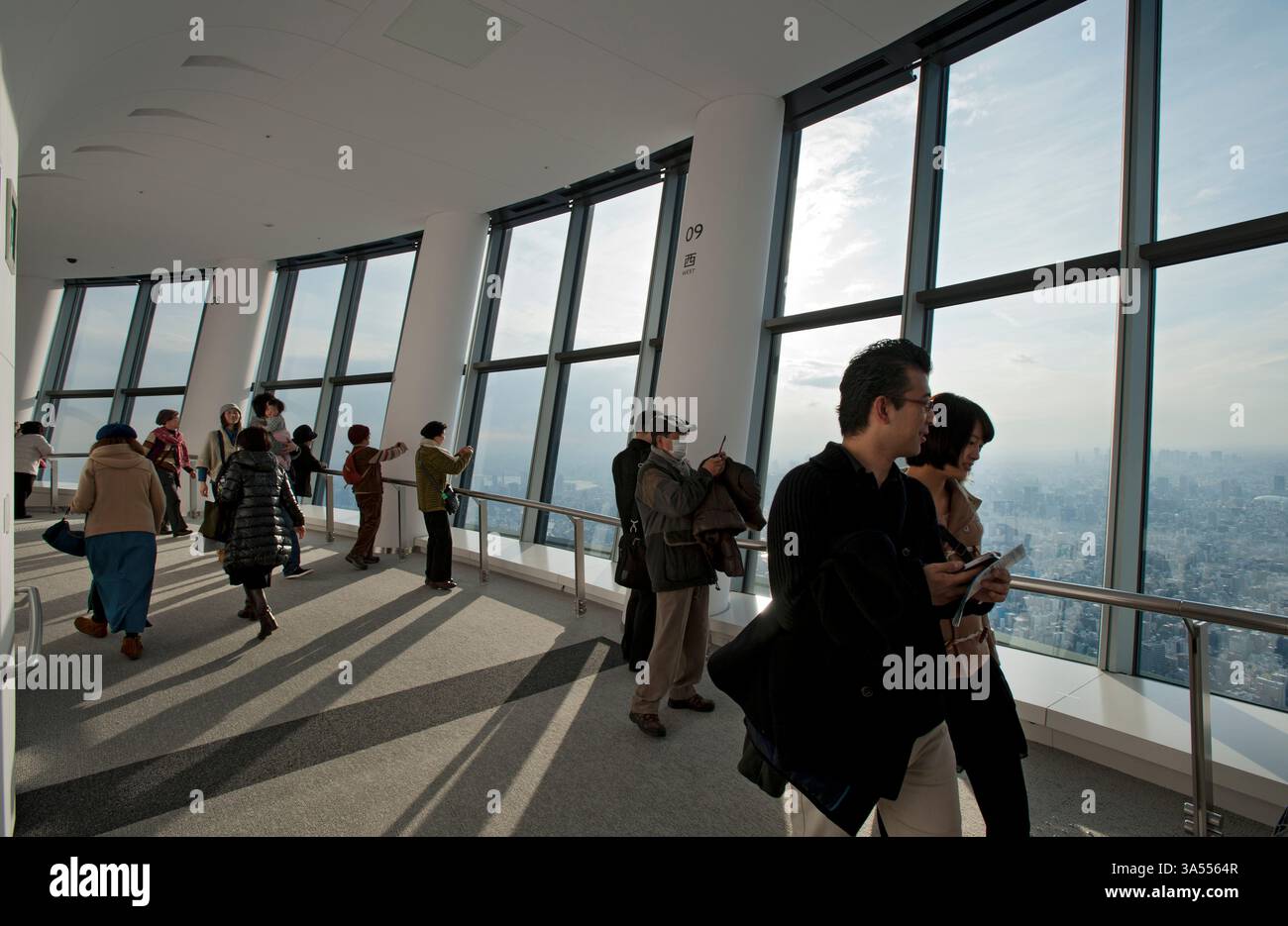 Visitors enjoying panoramic views of metropolitan Tokyo from the Tembo ...