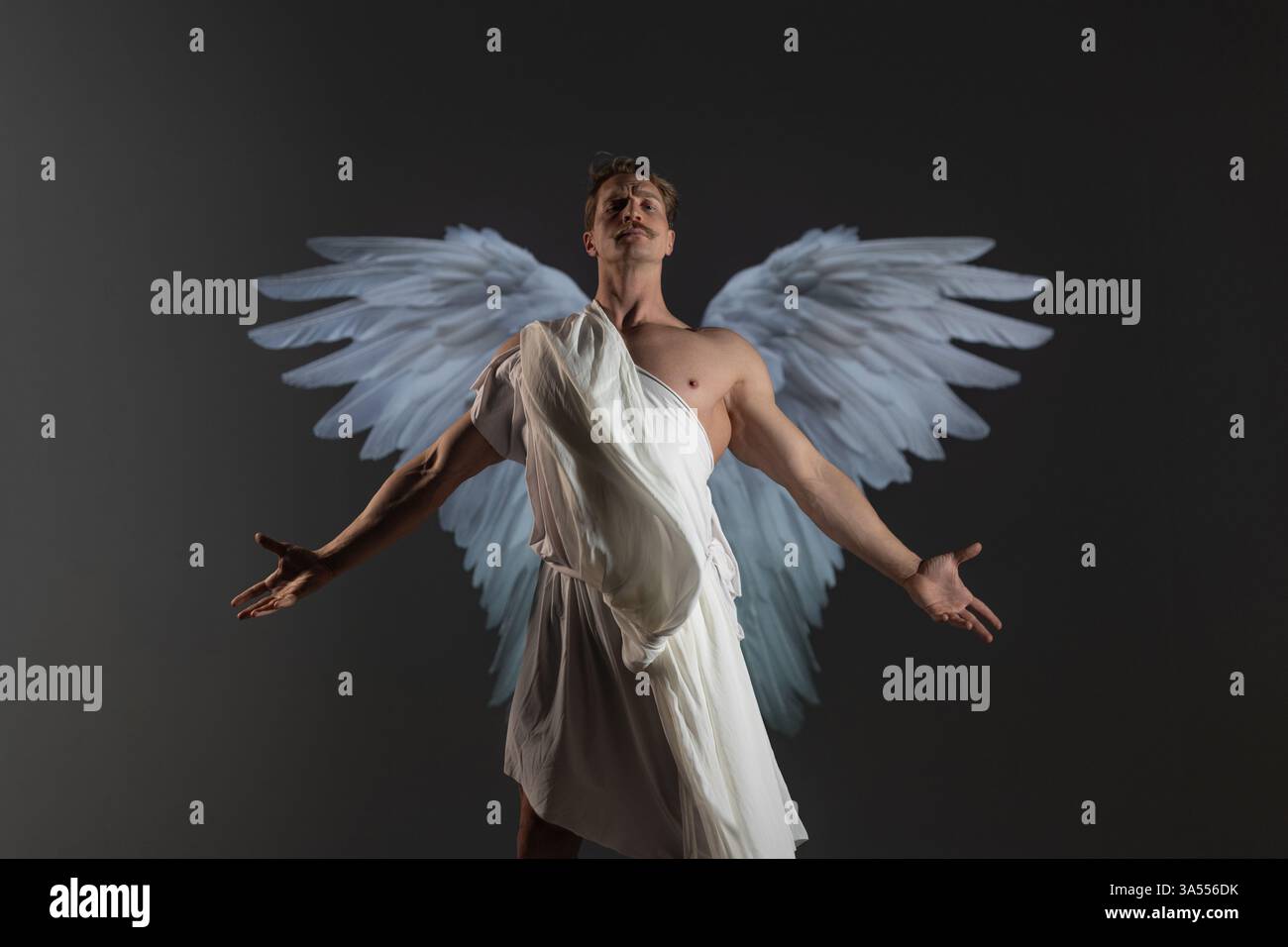 A muscular athlete with angel wings The figure embodies strength and ...
