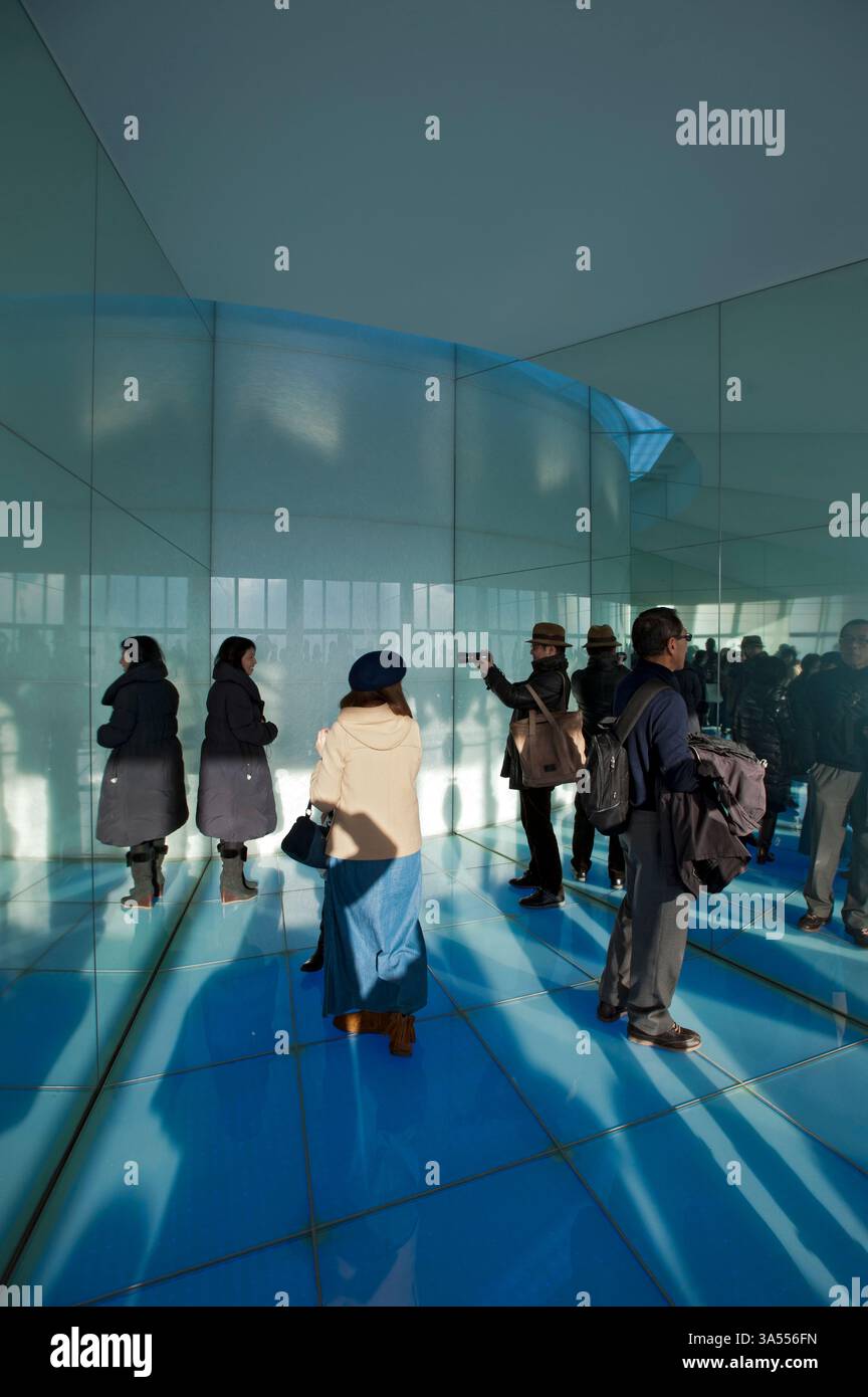 Visitors to the Tokyo Skytree enjoying the optical illusions inside the ...