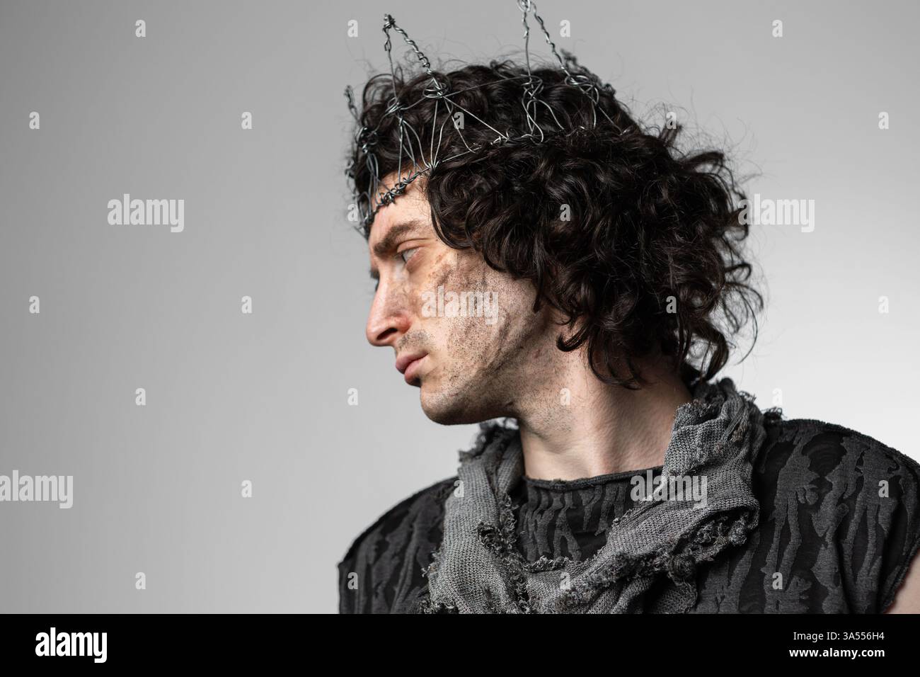 Hamlet in modern grunge or post-apocalyptic reinterpretation, young man ...