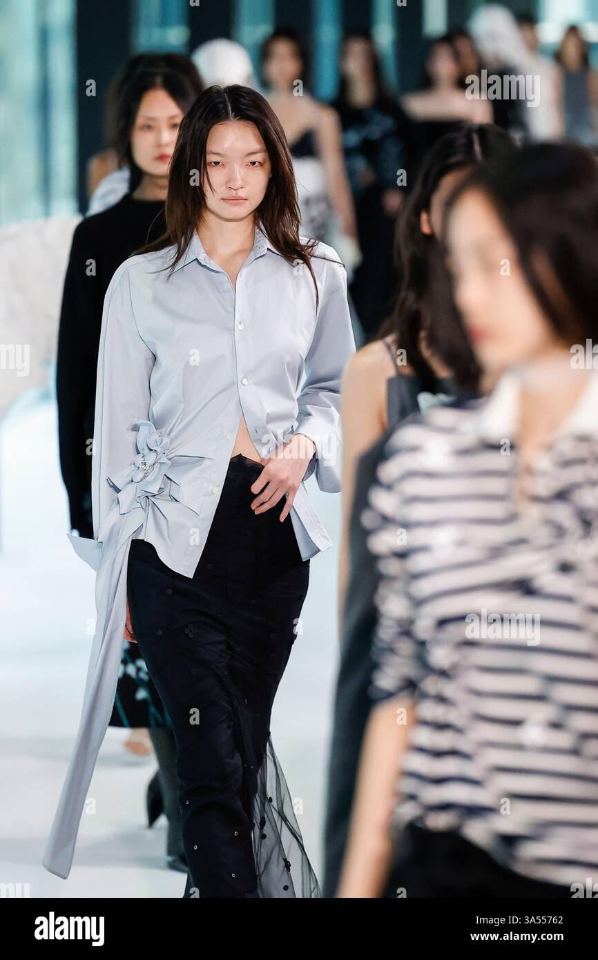 March 21, 2025, Tokyo, Japan: Models wearing fashion brand RIV NOBUHIKO ...