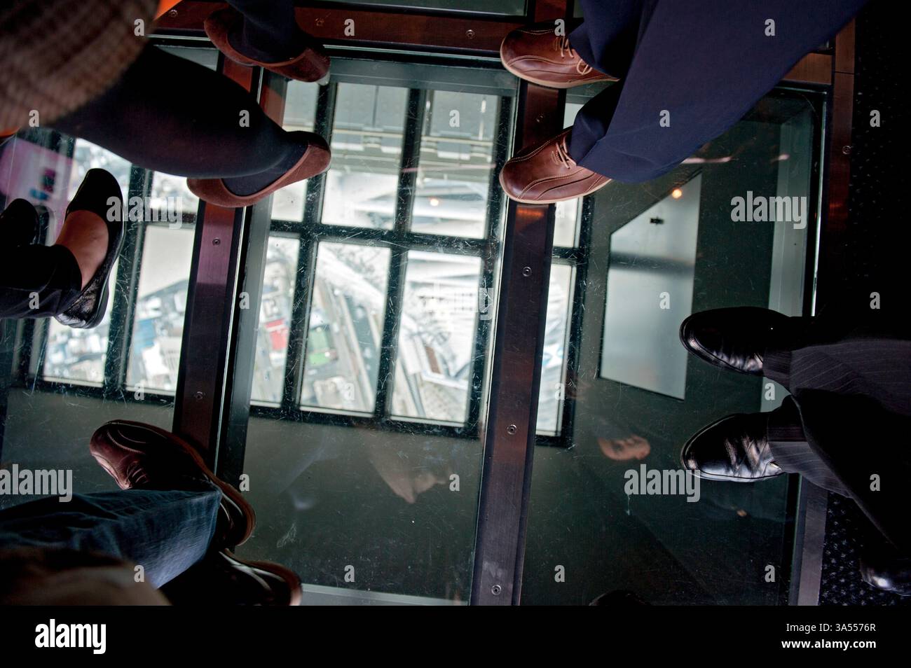 View straight down through a glass floor on the Tembo Deck of the Tokyo ...