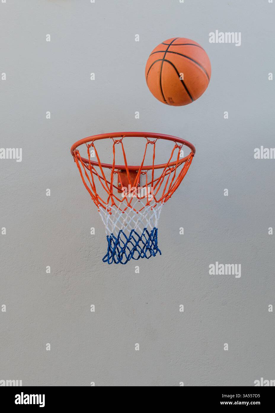 Basketball and hoop shoot and score net Stock Photo - Alamy